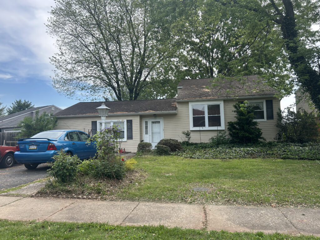 WELL LOCATED SPLIT LEVEL HOME - Hess Auction Group